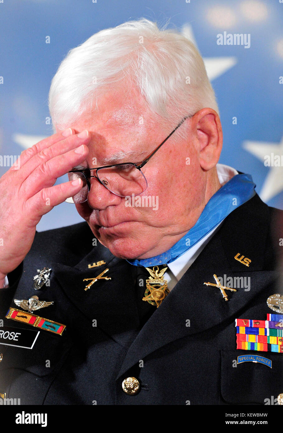 United States Army Captain Gary M. Rose takes a moment to reflect after ...
