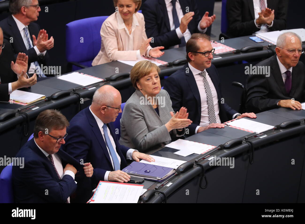 Berlin, Germany. 24th Oct, 2017. German chancellor Angela Merkel sits ...