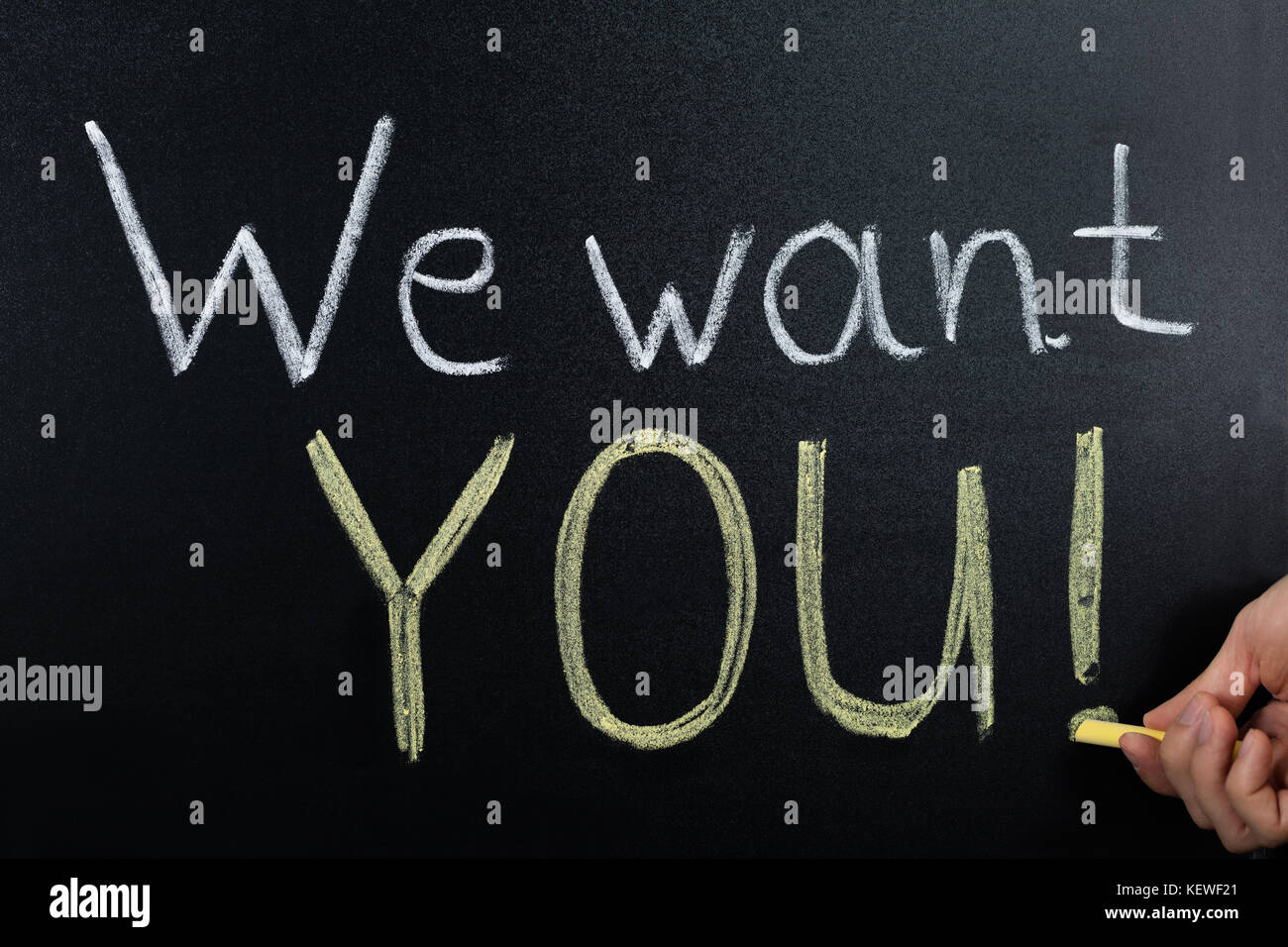 Close-up Of Person Hand With Written Text We Want You On Blackboard ...