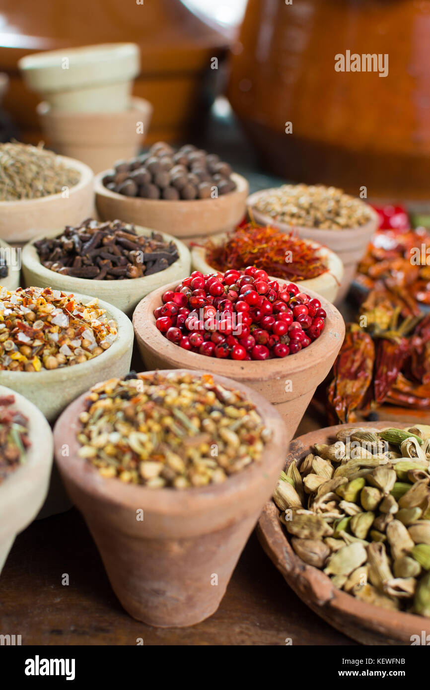 Variety of different asian and middle east spices, colorful assortment ...