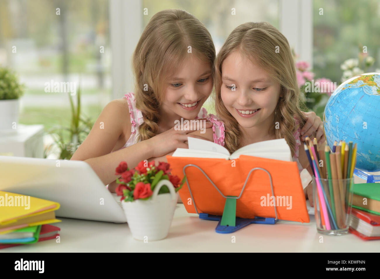 little girls doing homework Stock Photo - Alamy