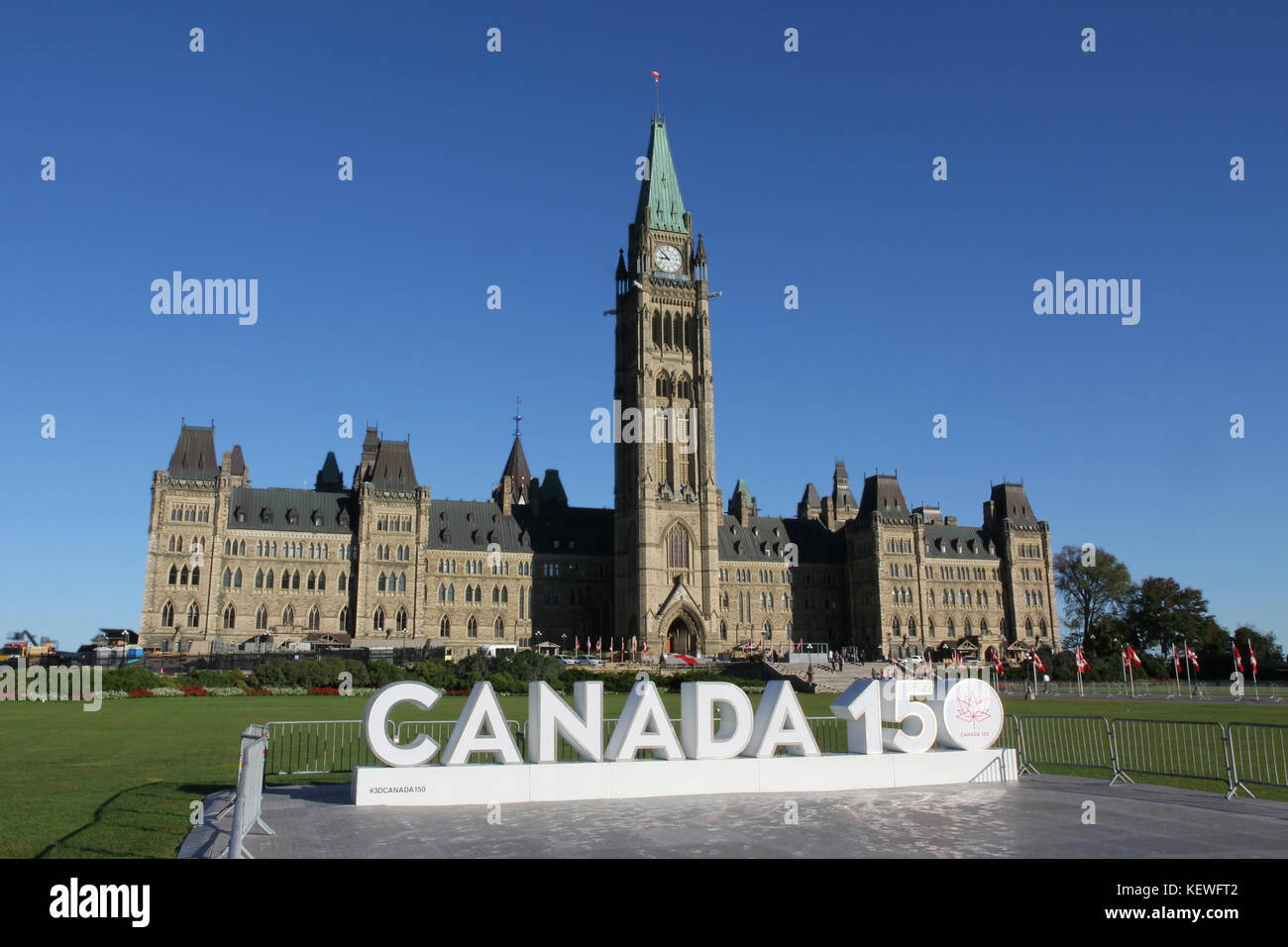 Centre Block of Parliament Hill with Canada 150 sign, Ottawa, Ontario ...