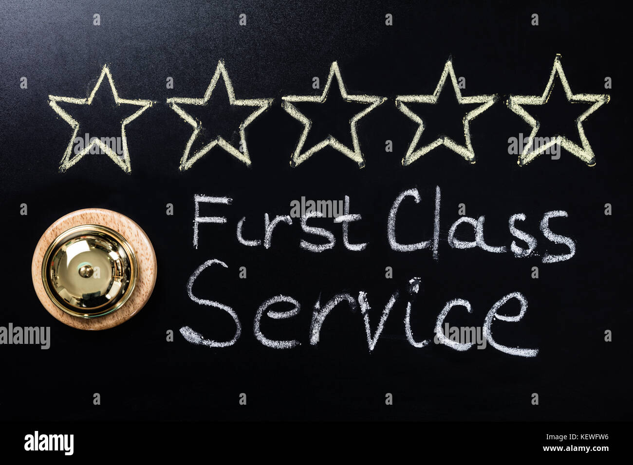 First Class Service With Service Bell Of Restaurant On Blackboard Stock ...