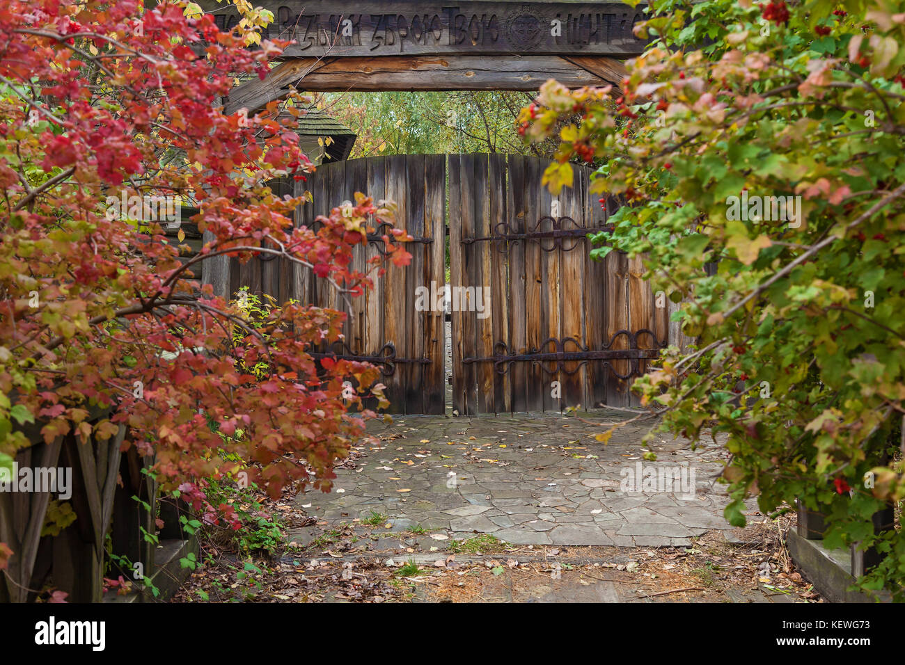 old wooden gate with iron forging Stock Photo - Alamy