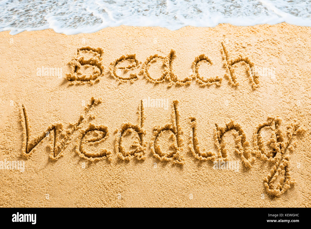 High Angle View Of A Beach Wedding Message Written On Sand Stock Photo ...
