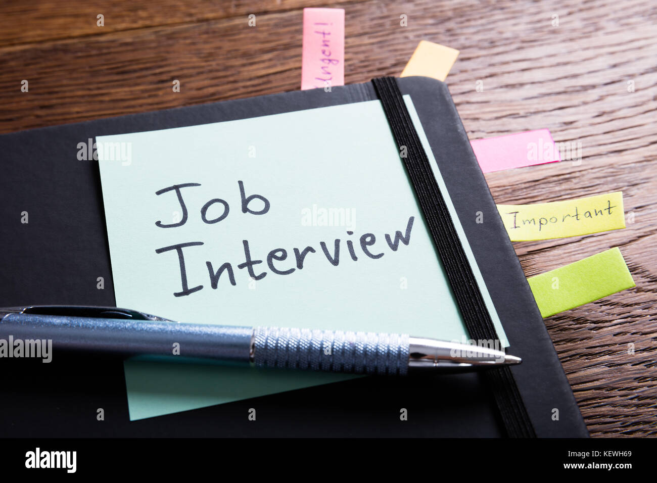 High Angle View Of A Job Interview Concept In Diary With Sticky Note ...