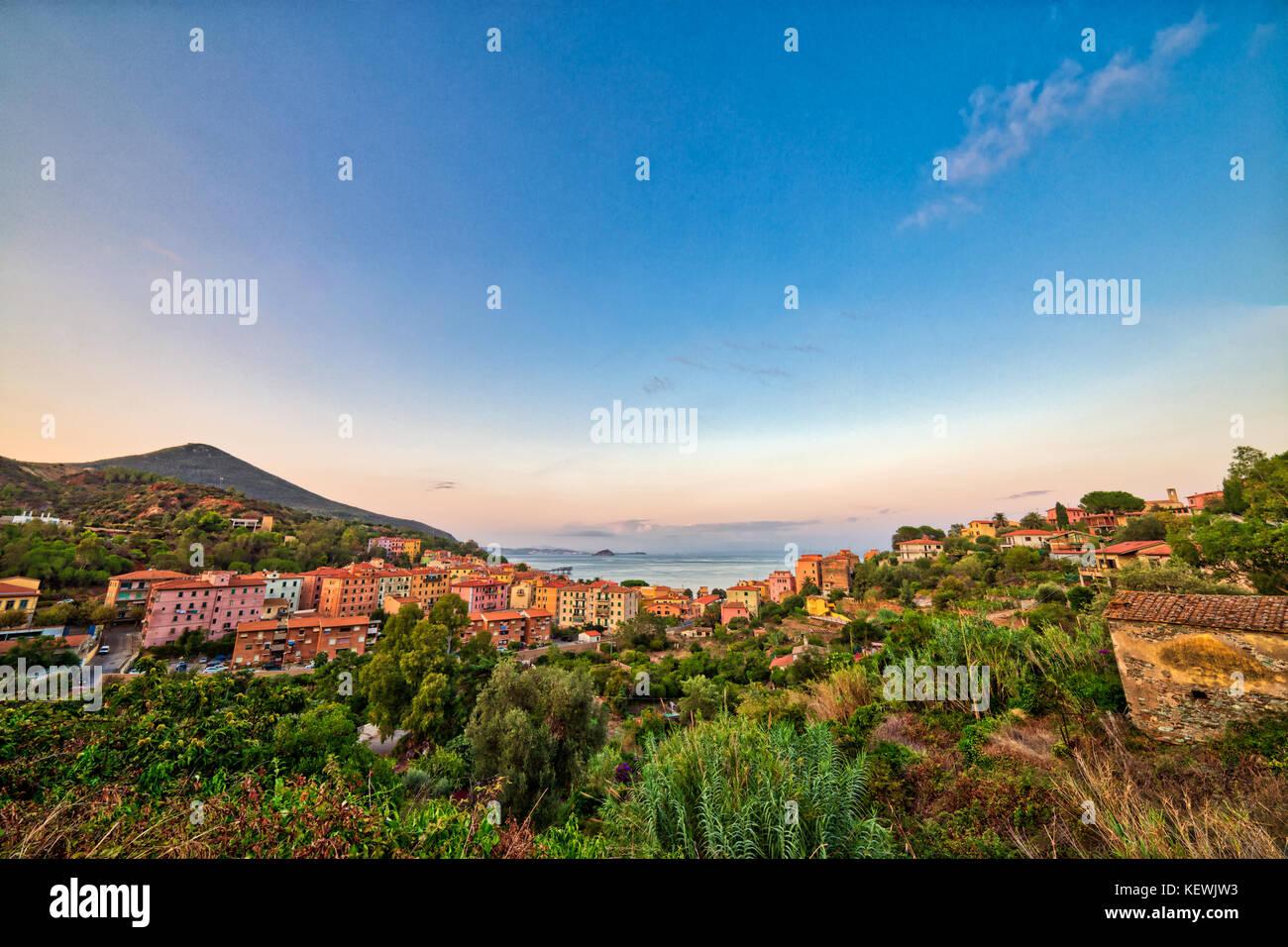 sunset on village of Island of Elba Stock Photo - Alamy