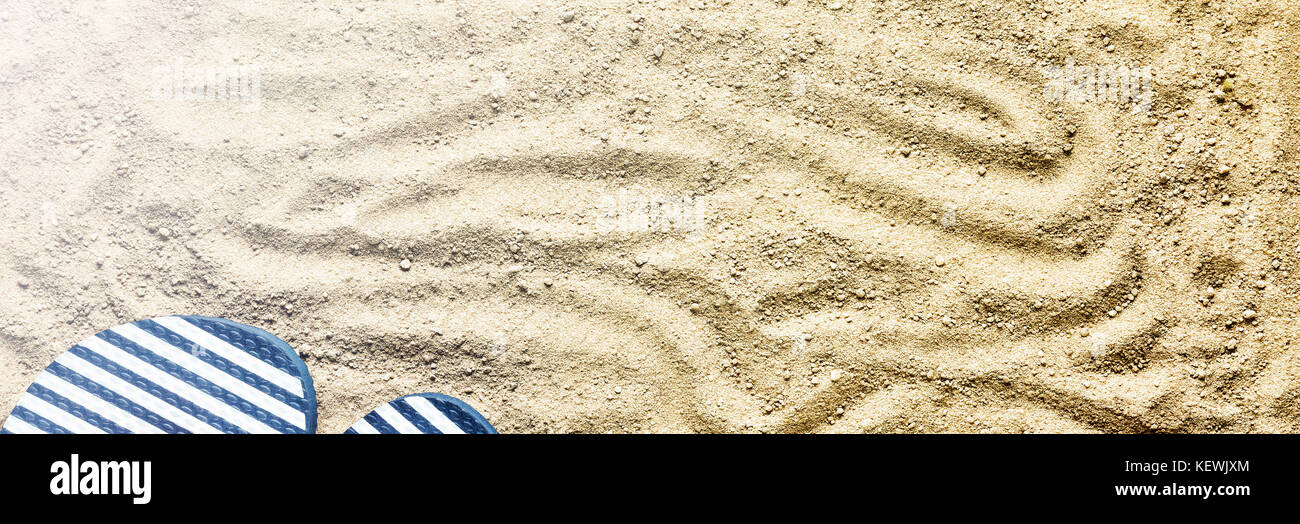 Beach background. Beach slippers and sunglasses on the seashore, golden ...