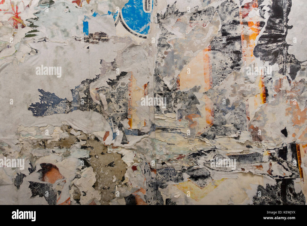 torn poster on a wall NYC Stock Photo - Alamy