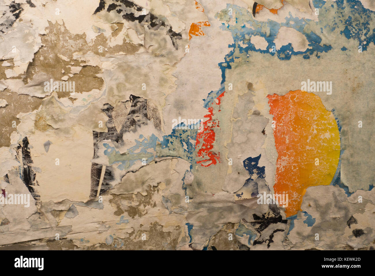 torn poster on a wall NYC Stock Photo - Alamy