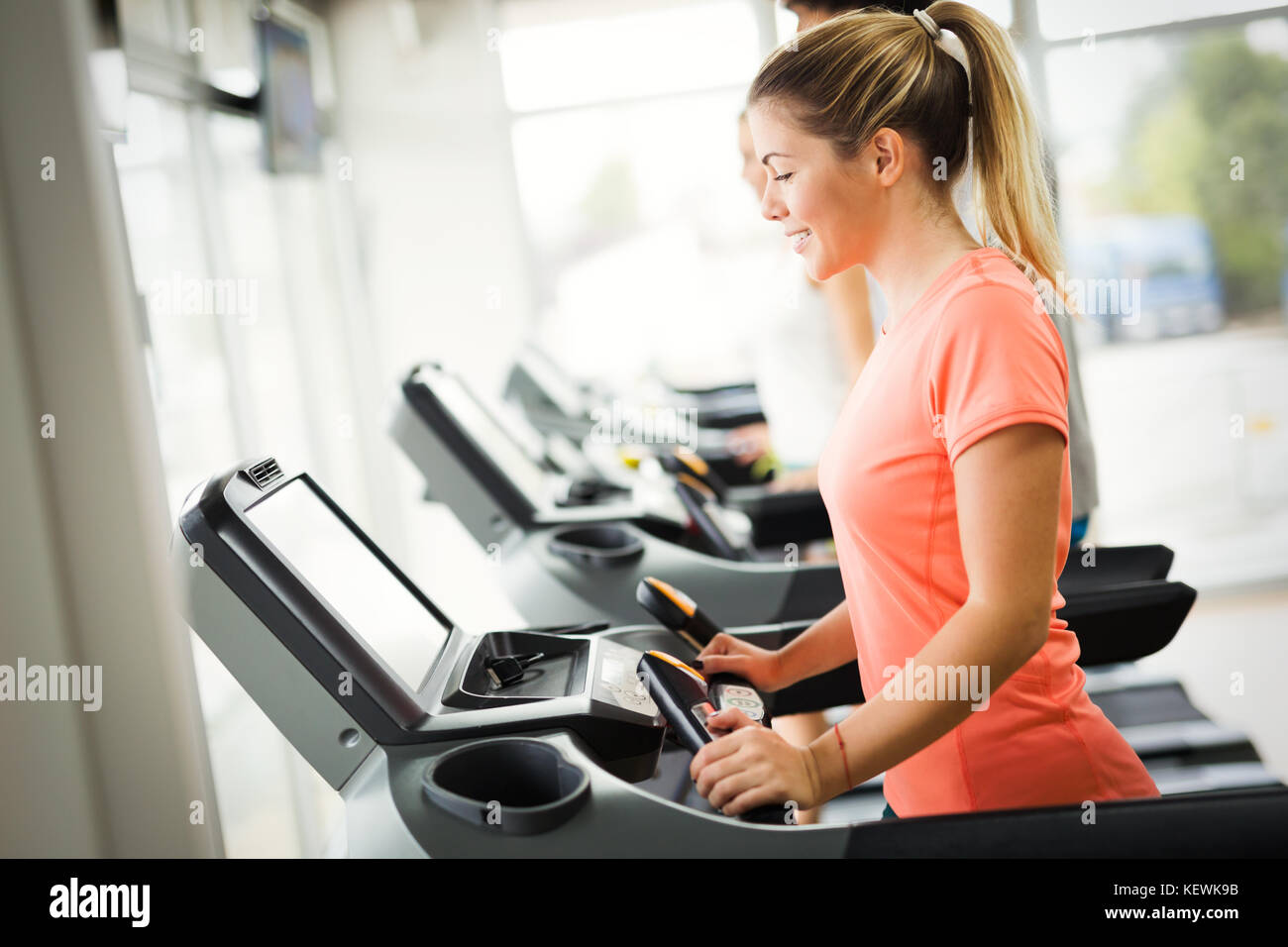 Gym woman attractive running hi-res stock photography and images - Alamy