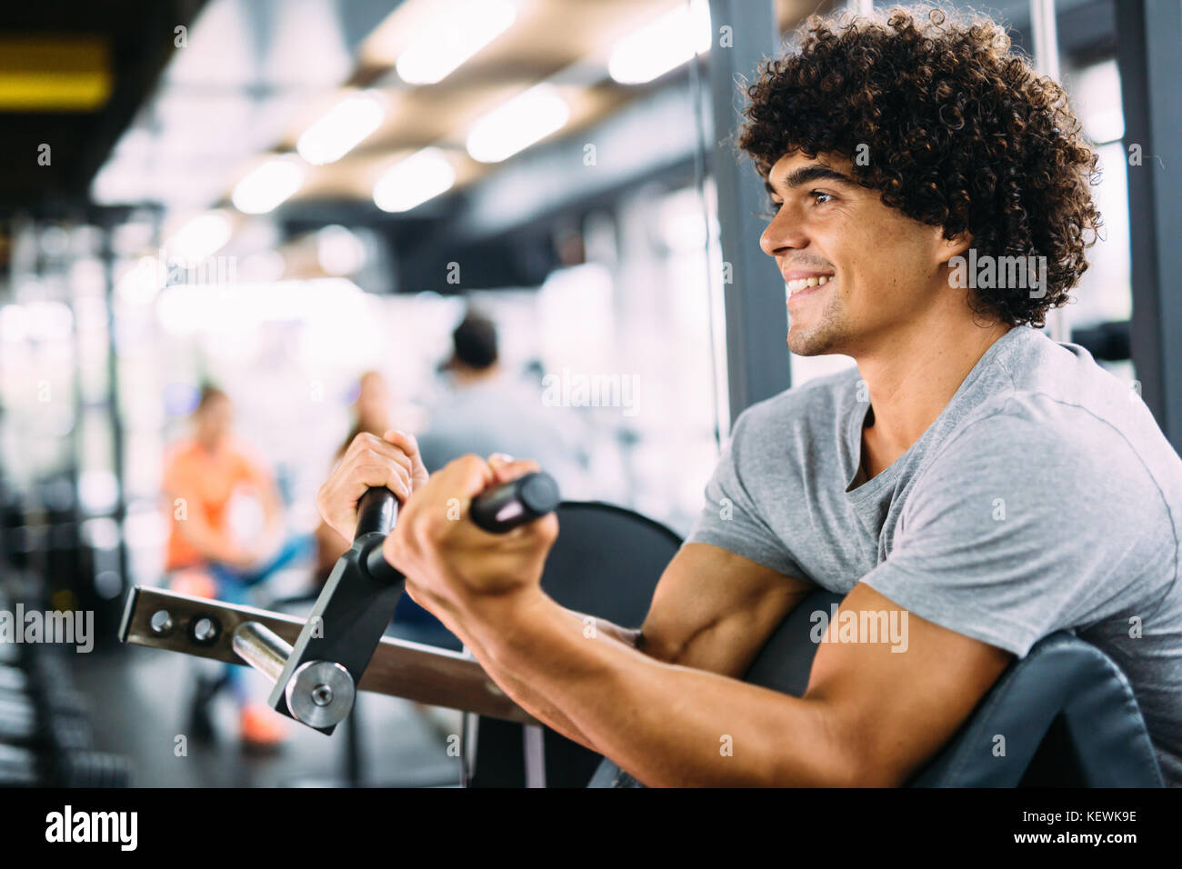 Happy bodybuilder doing exercise hi-res stock photography and images ...