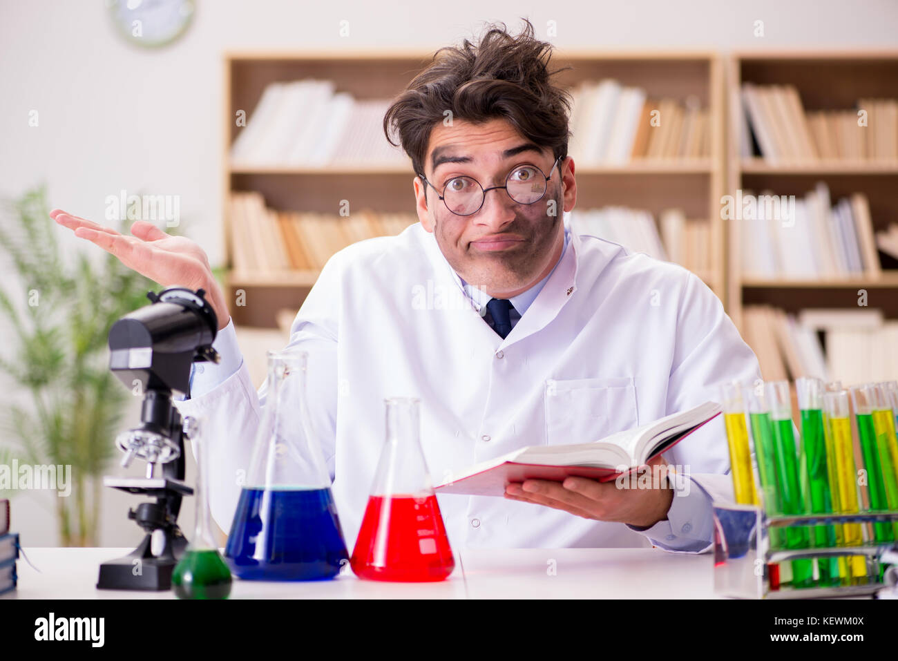 Mad crazy scientist doctor doing experiments in a laboratory Stock ...