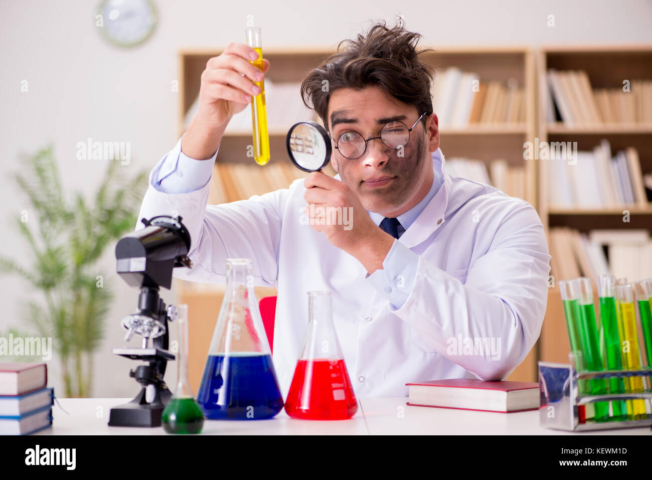 Mad crazy scientist doctor doing experiments in a laboratory Stock ...