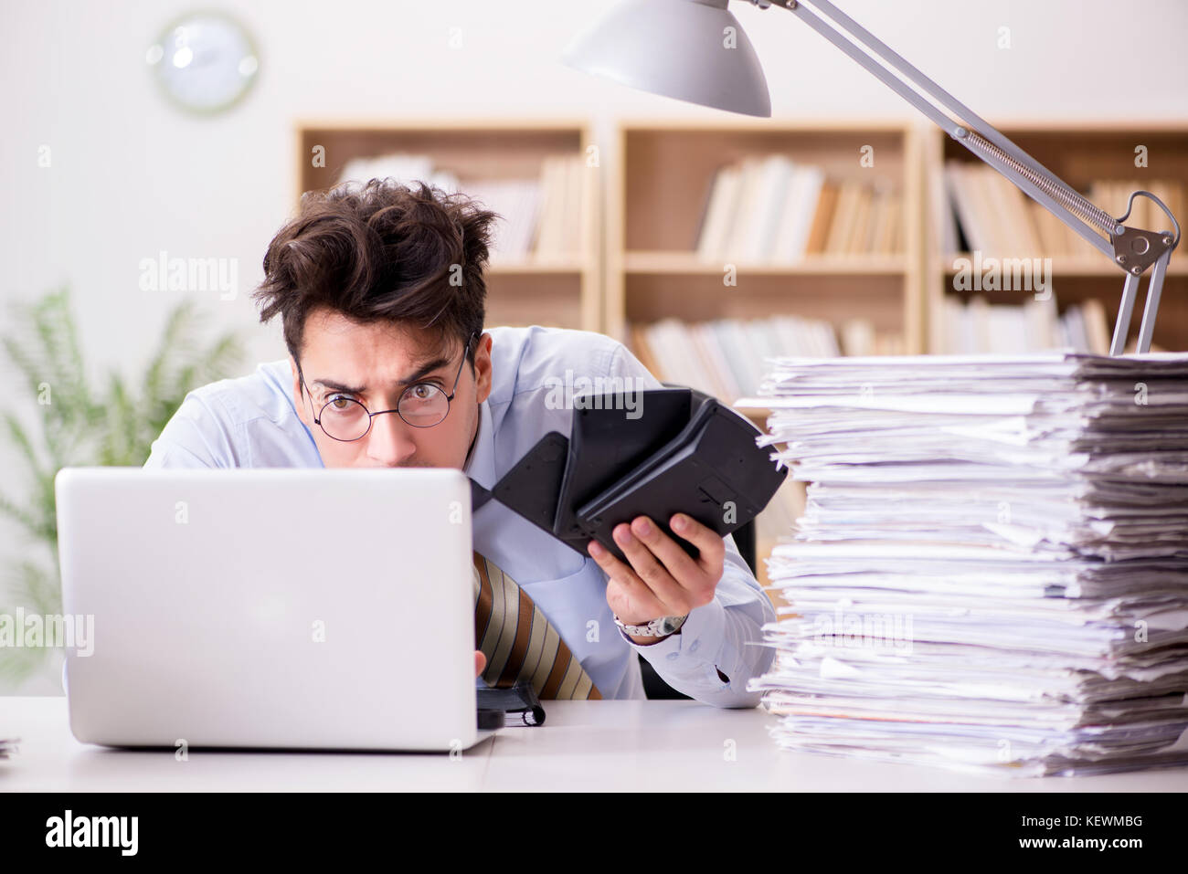 Funny accountant bookkeeper working in the office Stock Photo - Alamy