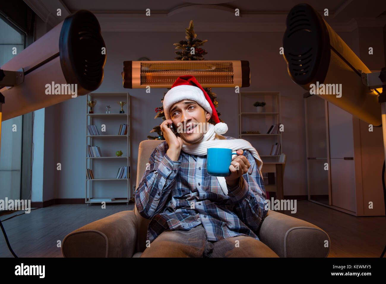 Man suffering from cold at home Stock Photo - Alamy