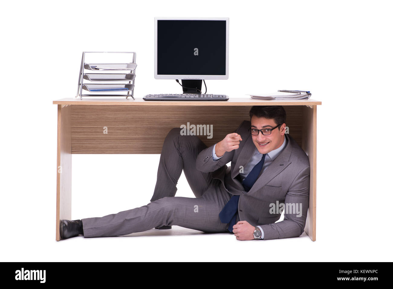 Person hiding under desk hi-res stock photography and images - Alamy