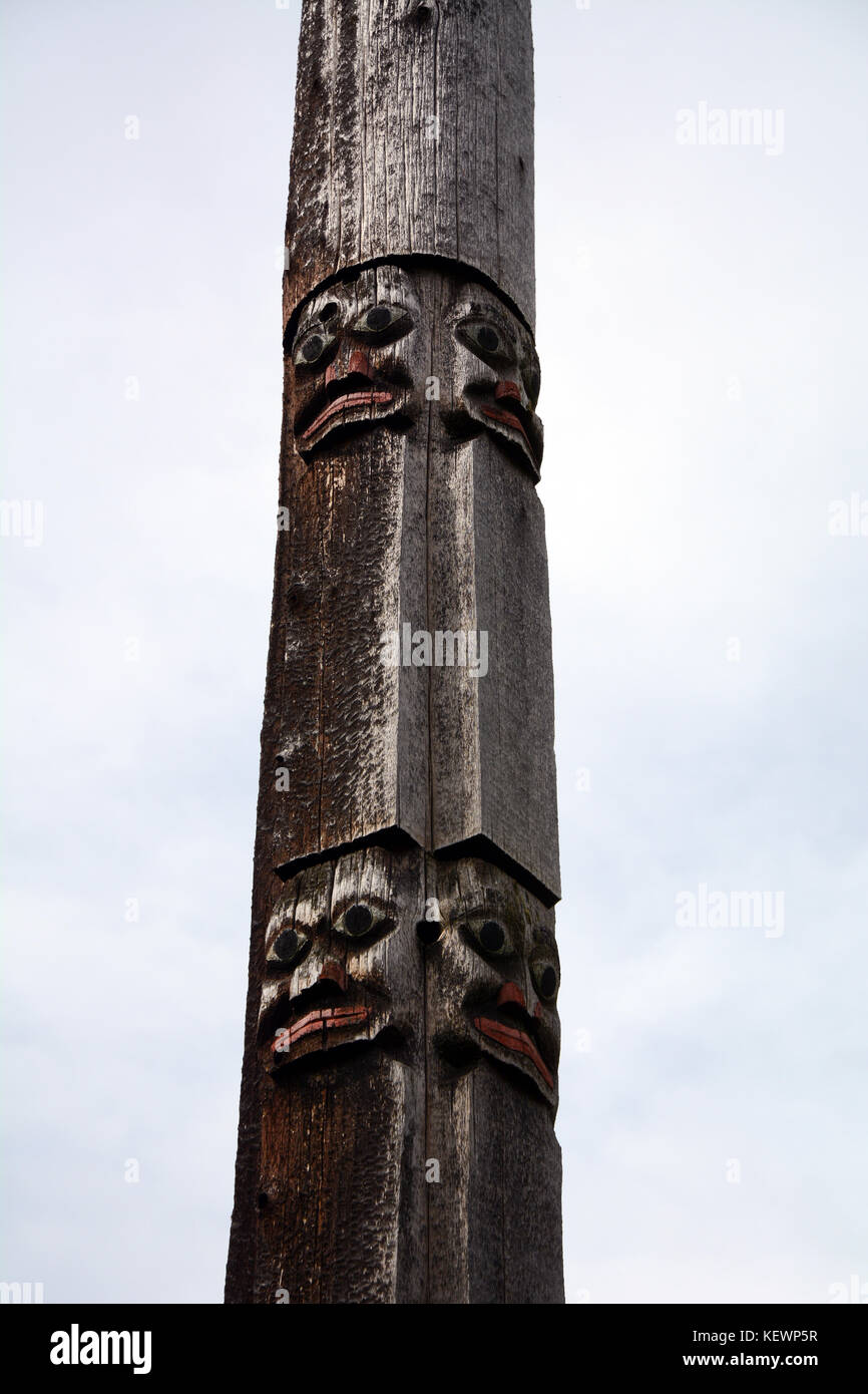 Traditional Northwest indigenous totem pole on display on the grounds ...