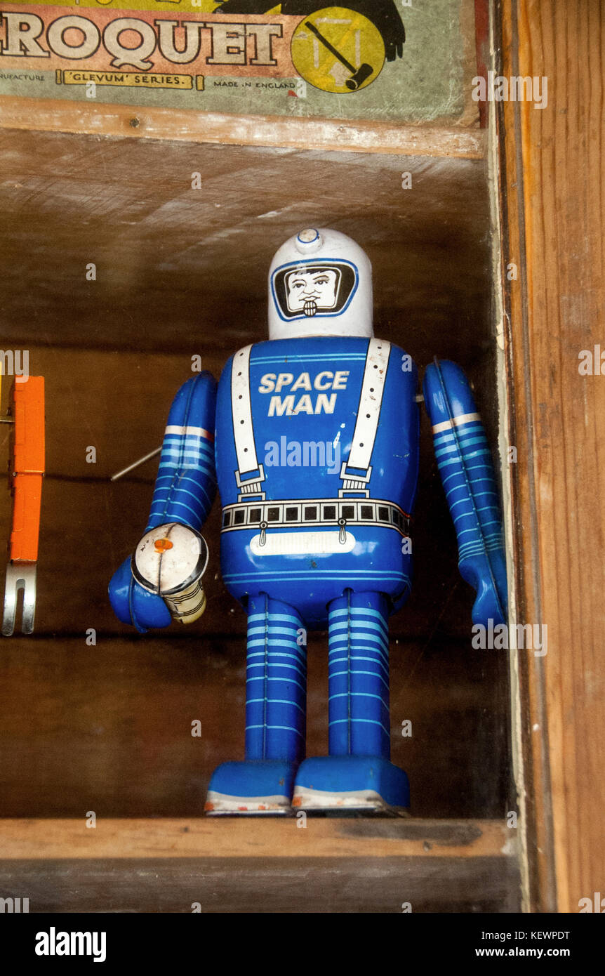 Toy robots sitting on a shelf Stock Photo - Alamy