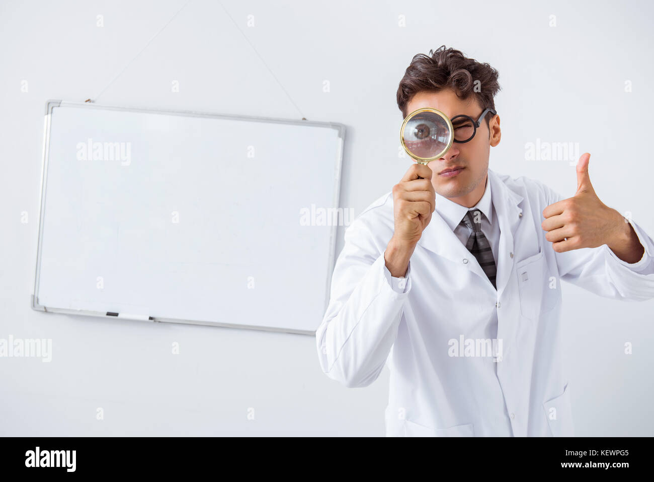 Funny doctor scientist making presentation in hospital Stock Photo - Alamy