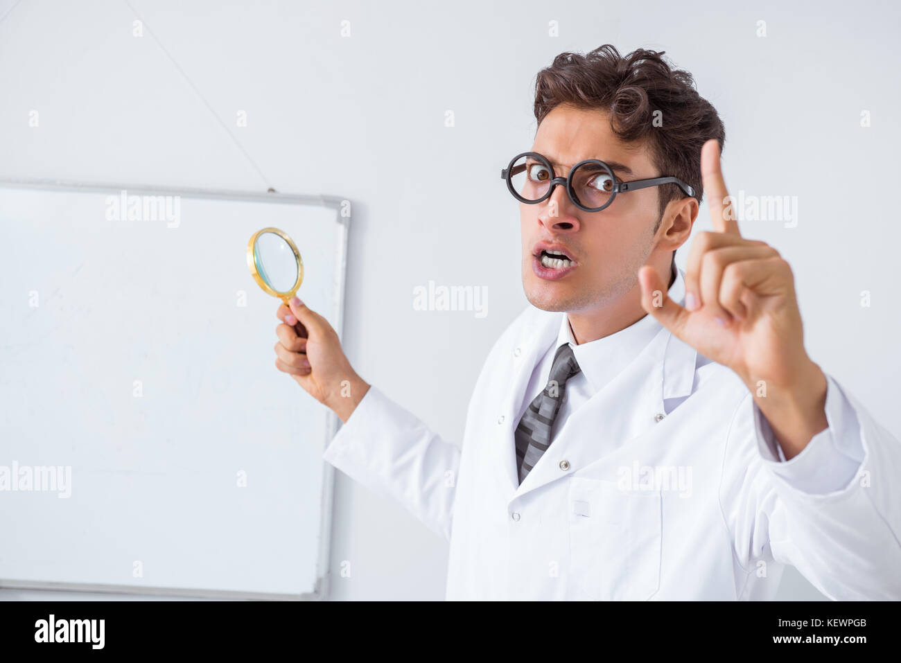 Funny doctor scientist making presentation in hospital Stock Photo - Alamy