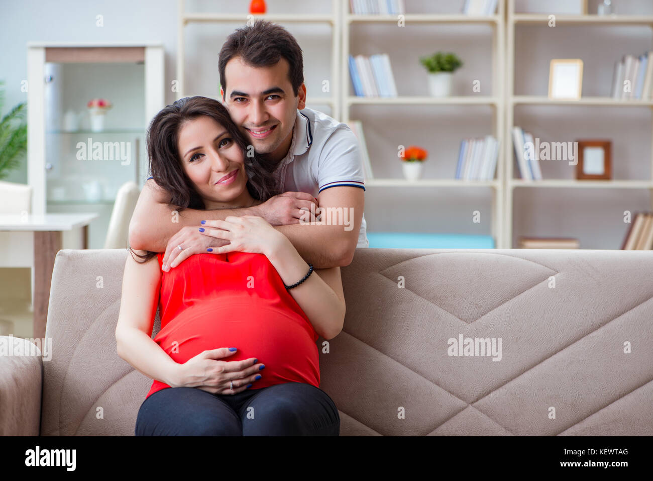 Young couple family expecting a baby Stock Photo - Alamy