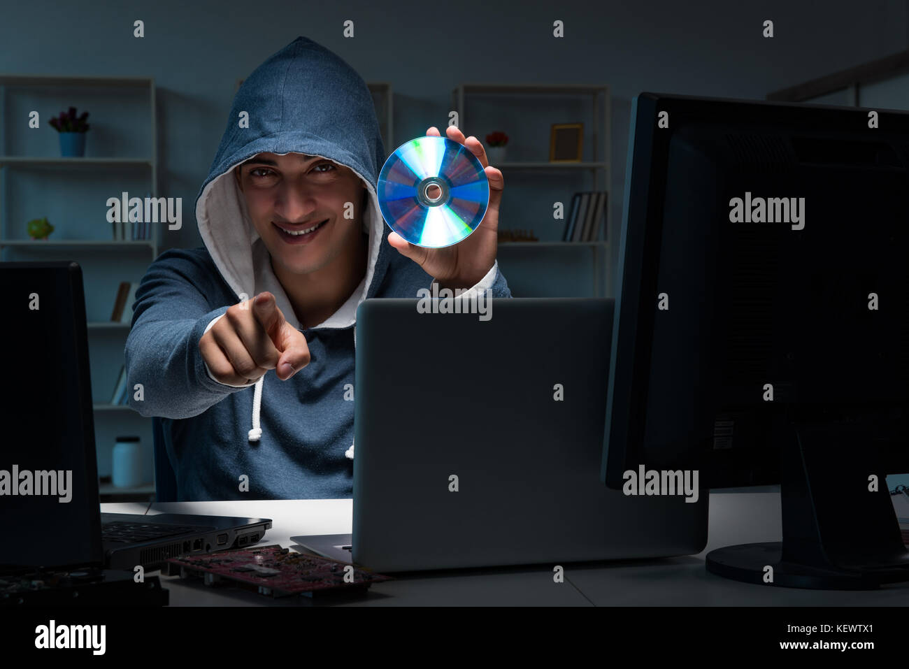 Hacker hacking computer at night Stock Photo - Alamy