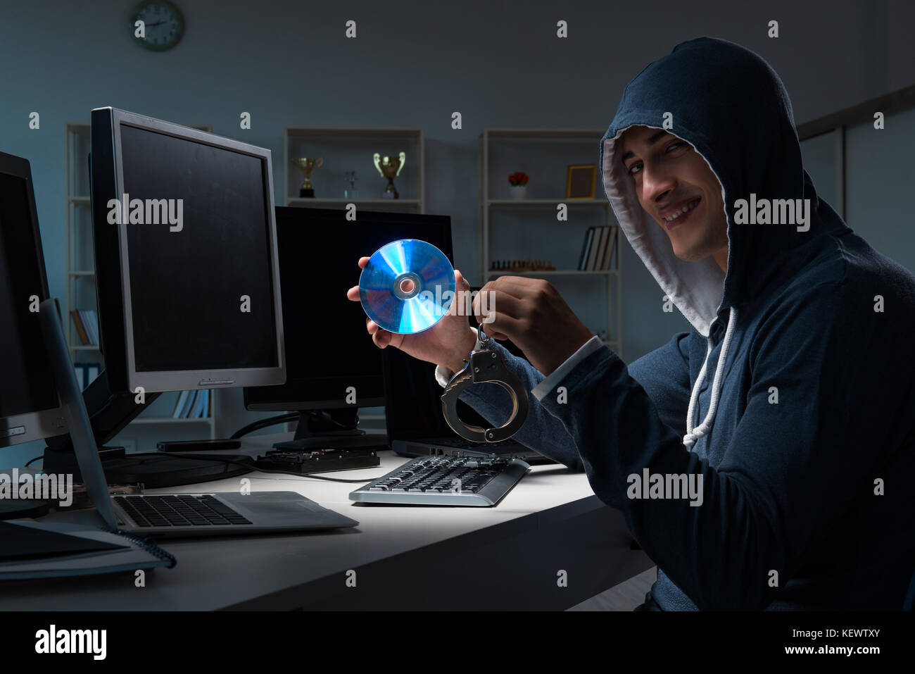 Hacker hacking computer at night Stock Photo - Alamy