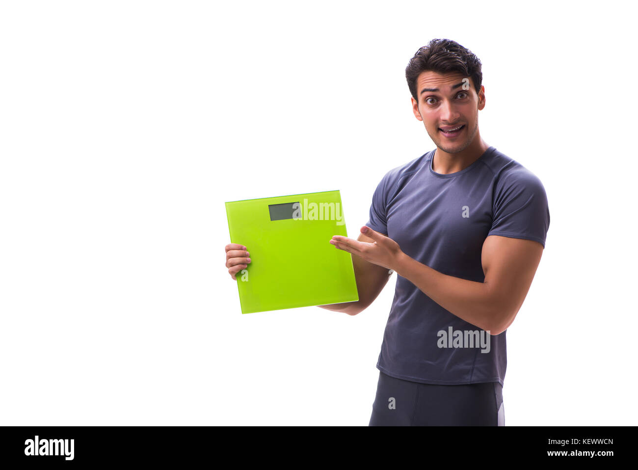 Man with scales in sports and health concept isolated on white Stock ...