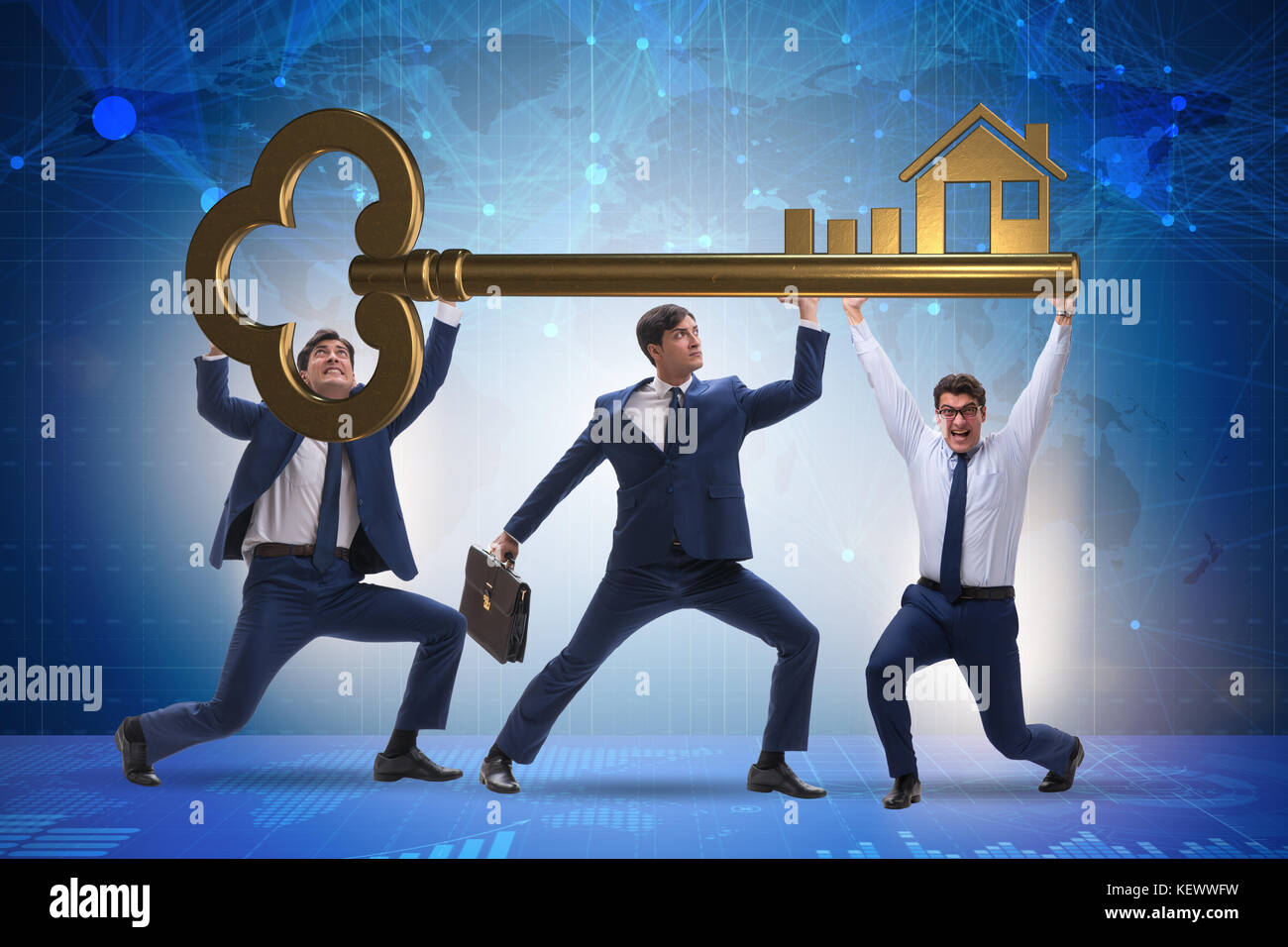 Businessmen holding giant key in real estate concept Stock Photo - Alamy
