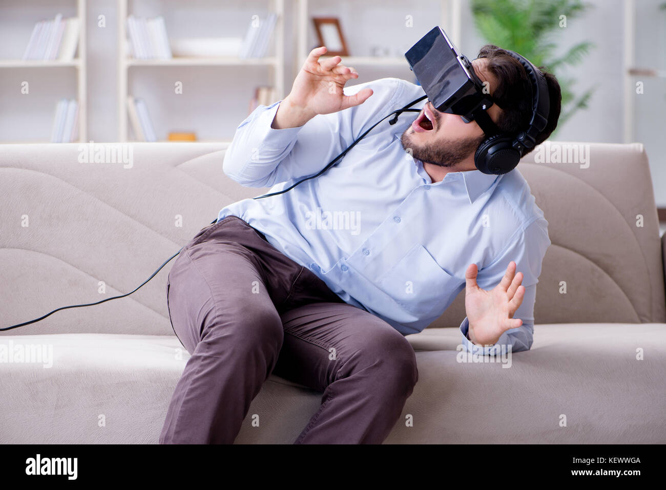Student gamer playing games at home Stock Photo - Alamy