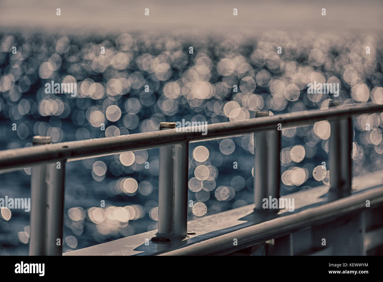 in australia the bokeh of light from the railings boat and ocean Stock Photo - Alamy
