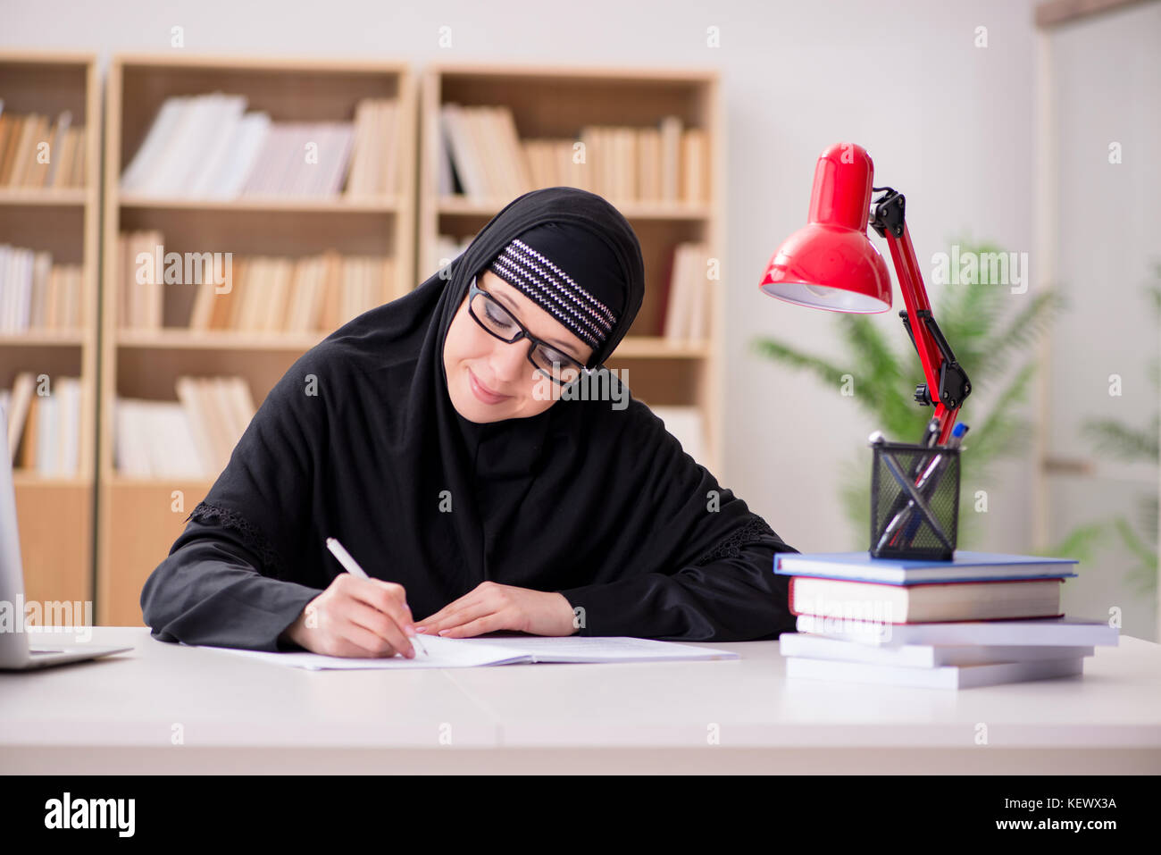 Muslim girl in hijab studying preparing for exams Stock Photo - Alamy