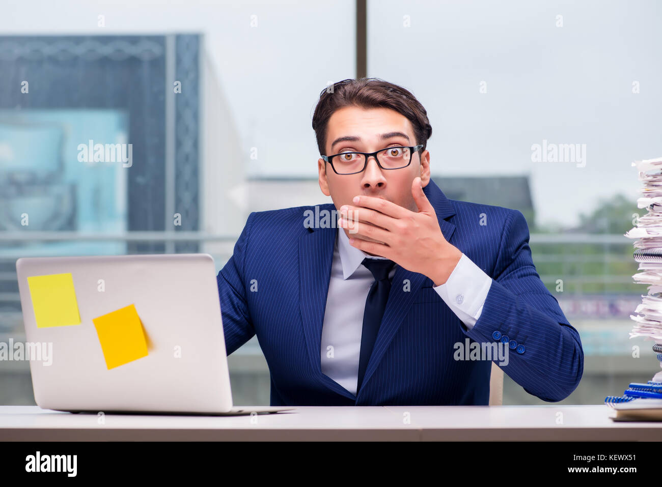 Workaholic businessman overworked with too much work in office Stock ...