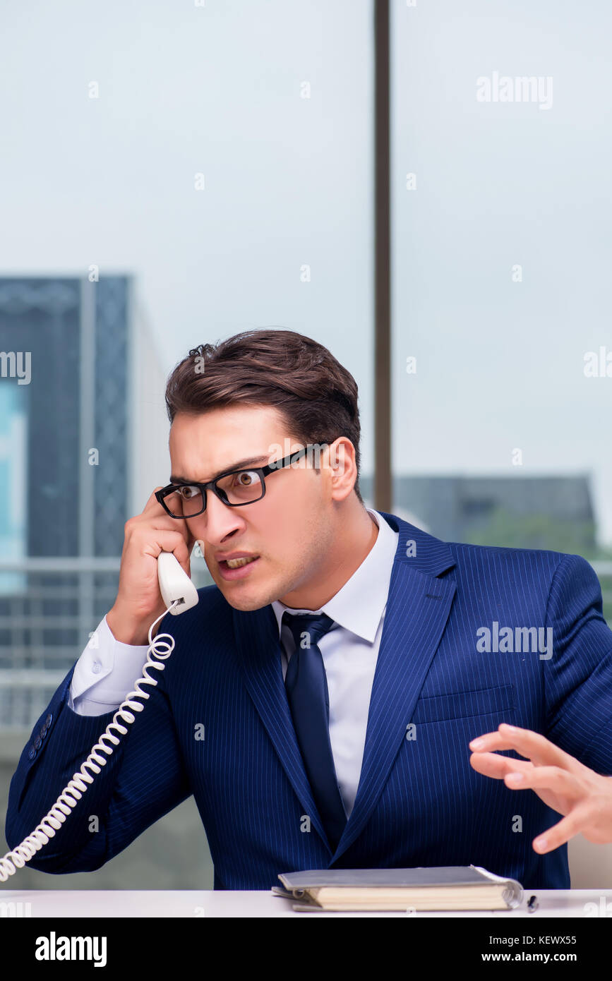 Angry call center employee yelling at customer Stock Photo - Alamy