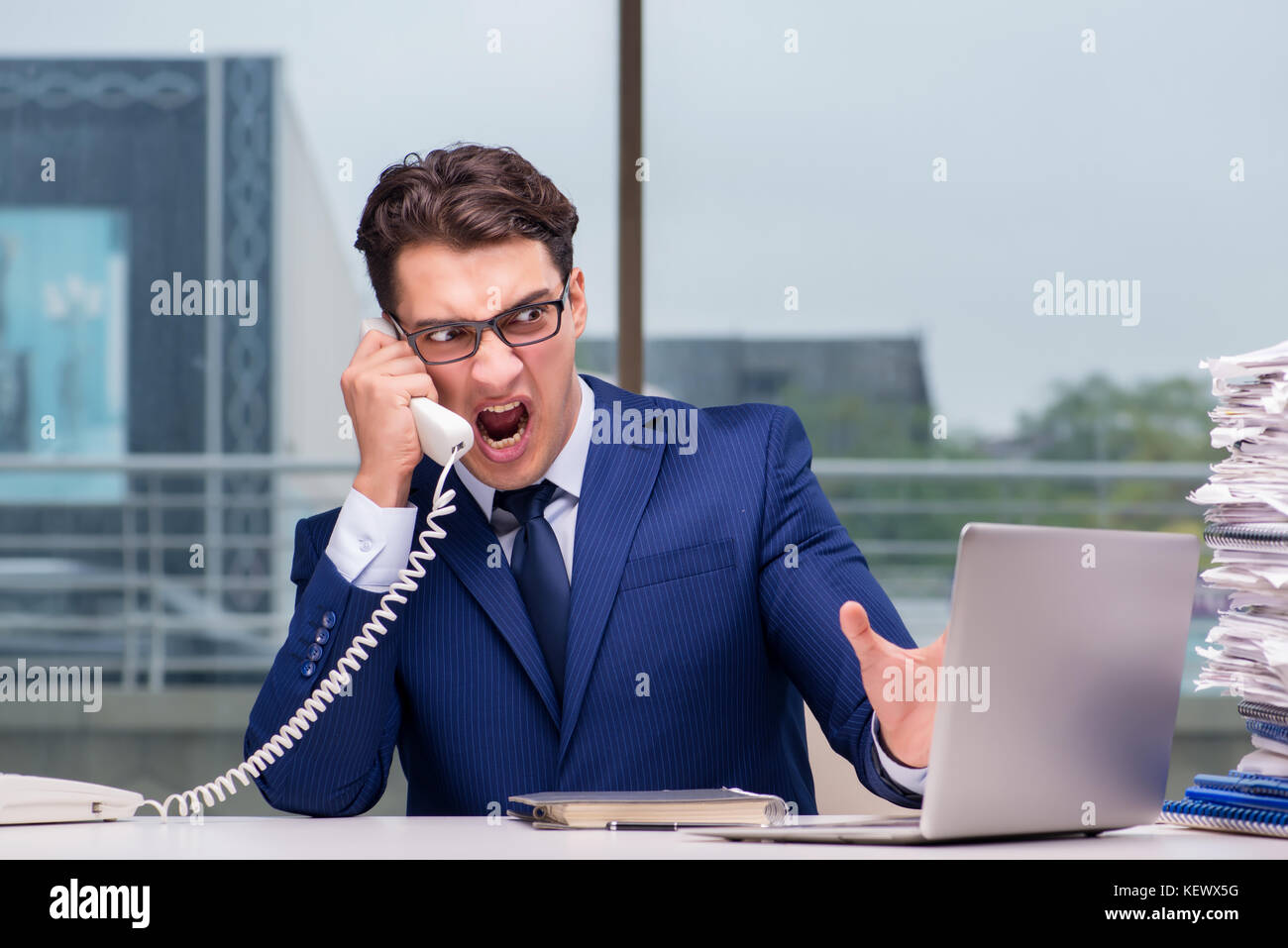 Angry call center employee yelling at customer Stock Photo - Alamy