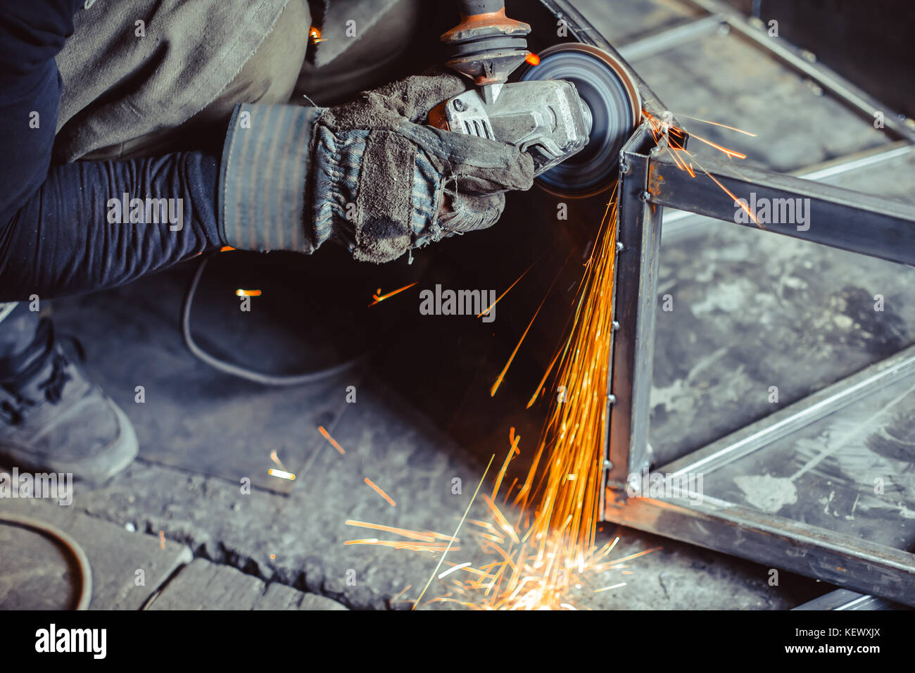 worker sawing the iron Stock Photo - Alamy