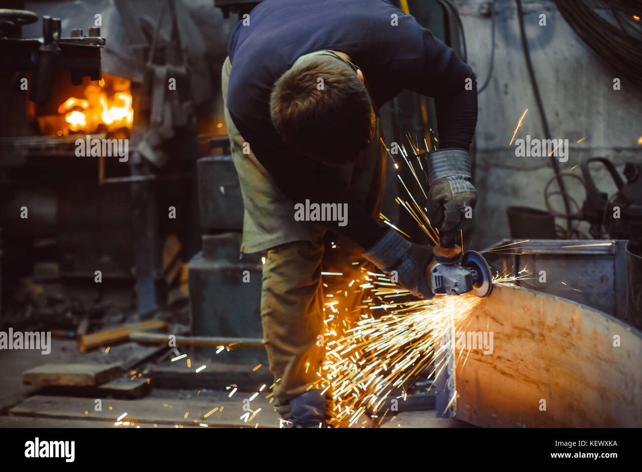 worker sawing the iron Stock Photo - Alamy