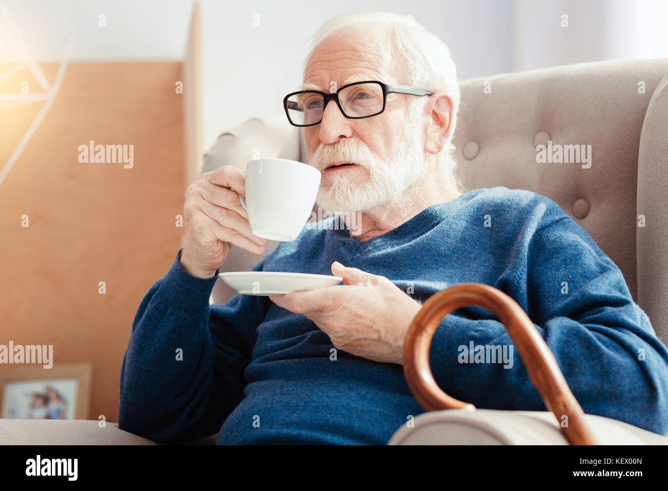 Portrait of serious retirement while thinking Stock Photo - Alamy