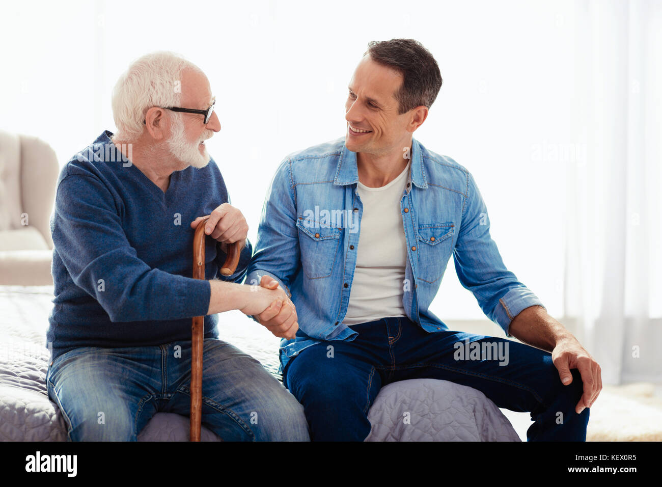 Friendly relationships between grandson and grandfather Stock Photo - Alamy