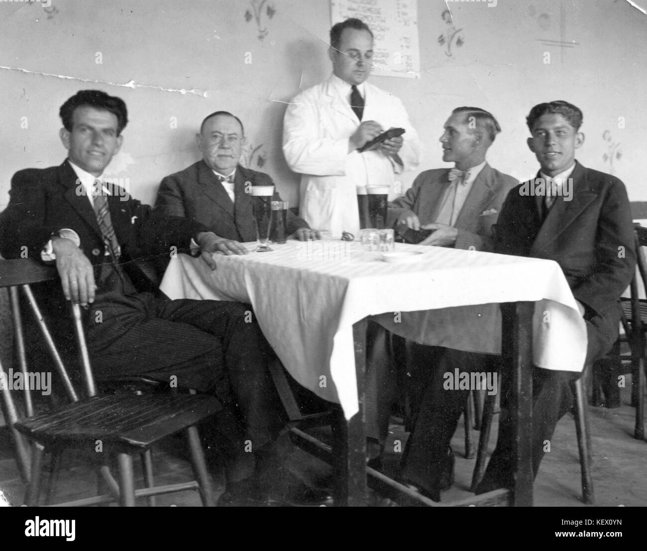 Vintage waiter with beer hi-res stock photography and images - Alamy