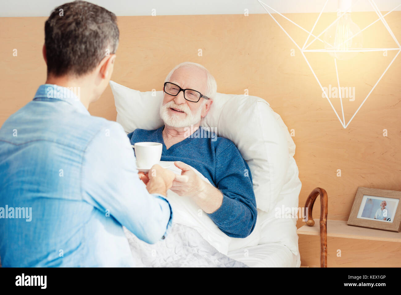 Positive delighted man feeling happiness Stock Photo - Alamy