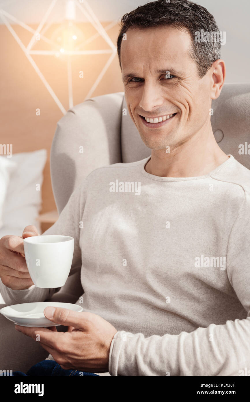 Attractive male person looking at camera Stock Photo - Alamy