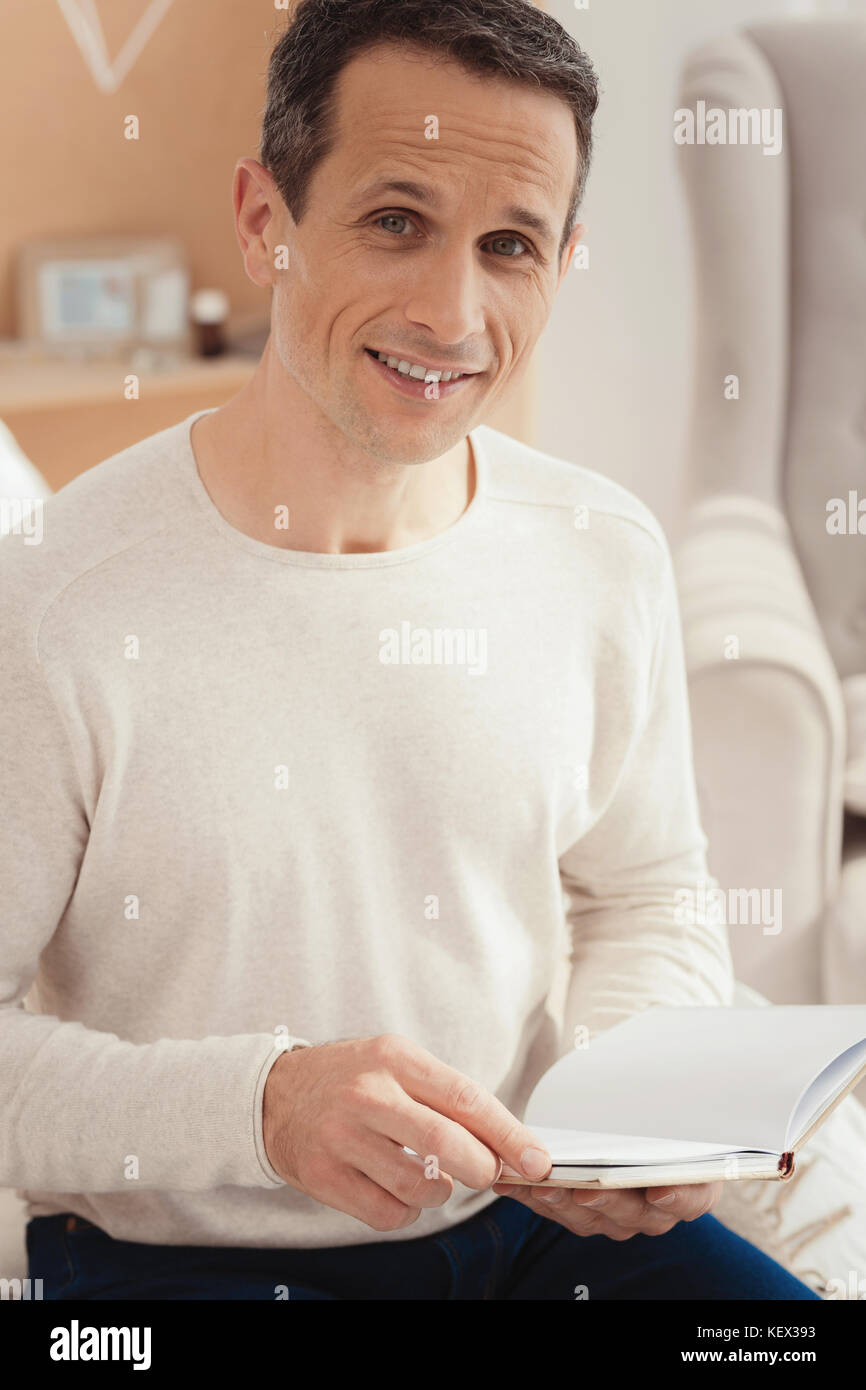 Handsome man looking straight at camera Stock Photo - Alamy