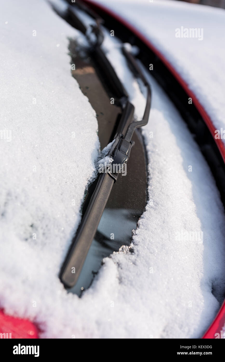Snow covered car, front winsdshield and wipers detail Stock Photo - Alamy