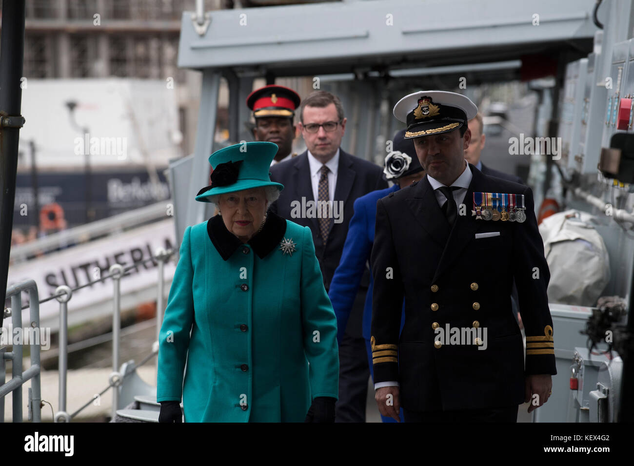 Queen Elizabeth II with Captain Andrew Canale during a visit to HMS ...