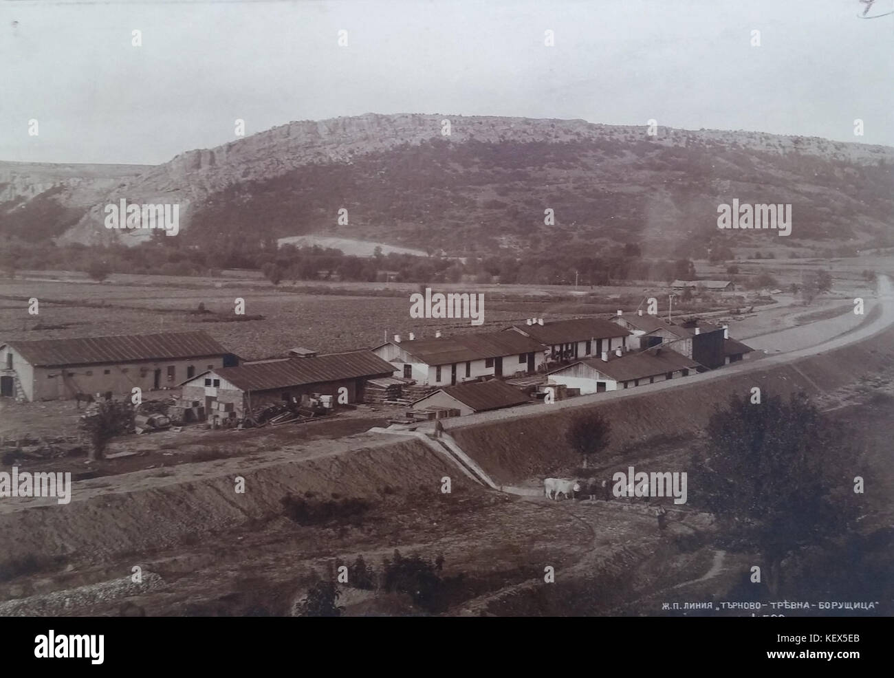 A historic photograph capturing a section of a railroad, showcasing the ...