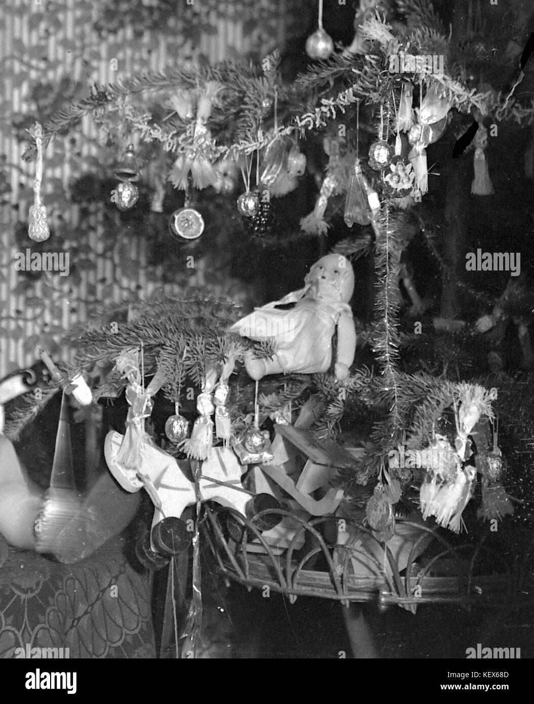 A Christmas scene featuring traditional elements such as candy, toys, a ...