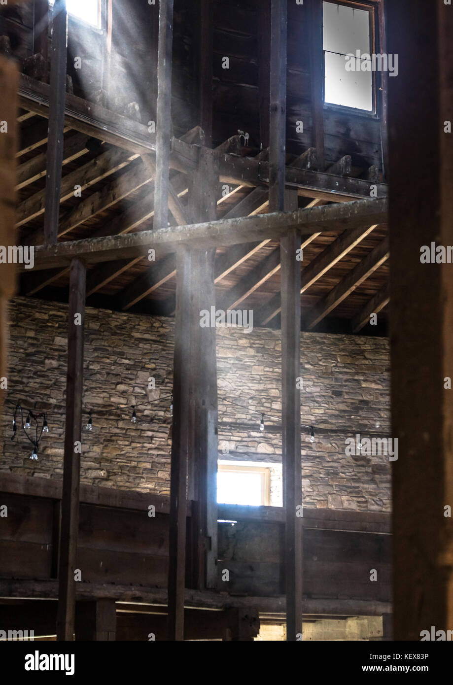 Beam of sunlight through the interior of a barn Stock Photo - Alamy