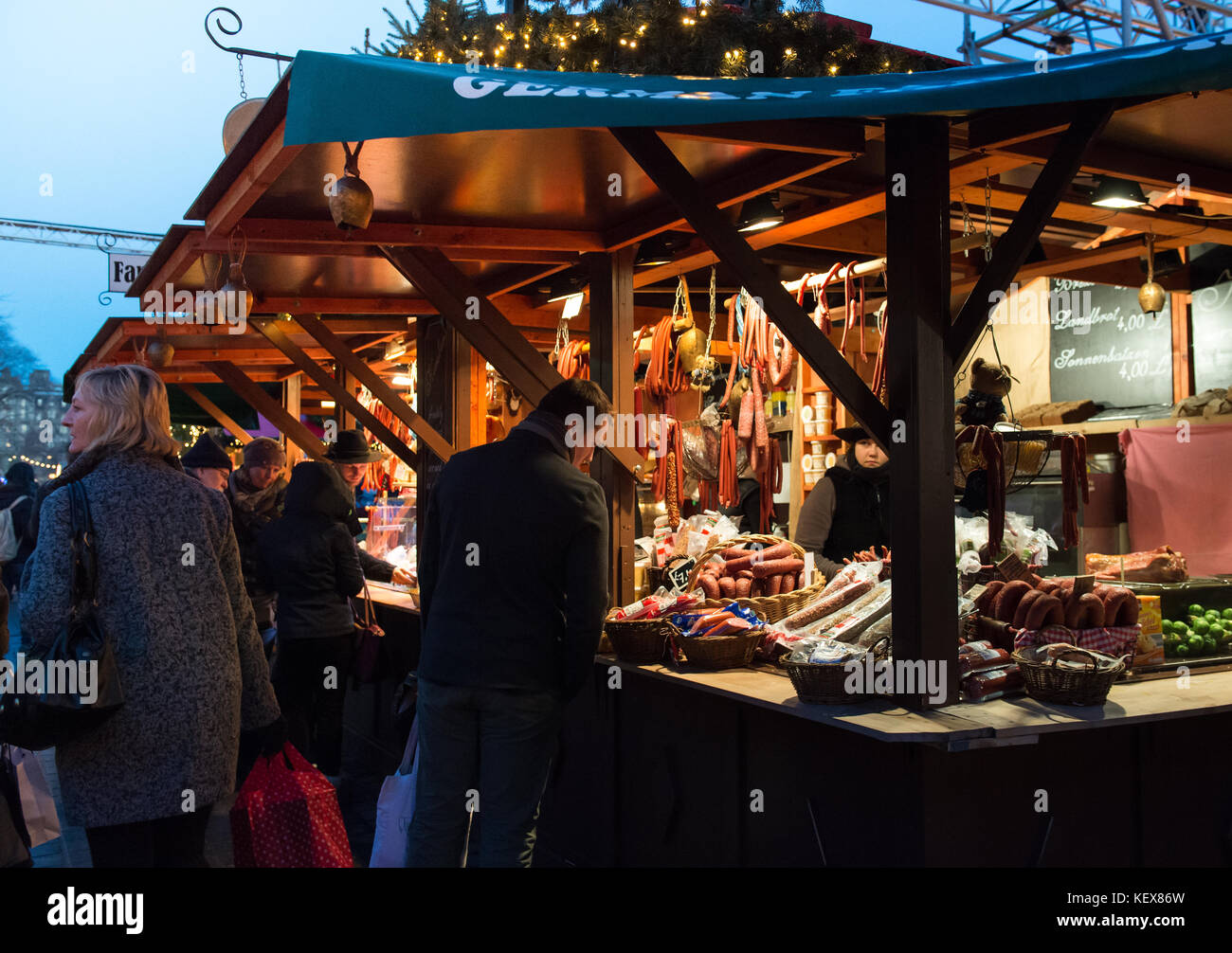 EDINBURGH, SCOTLAND, UK – December 08, 2014 - People walking among ...